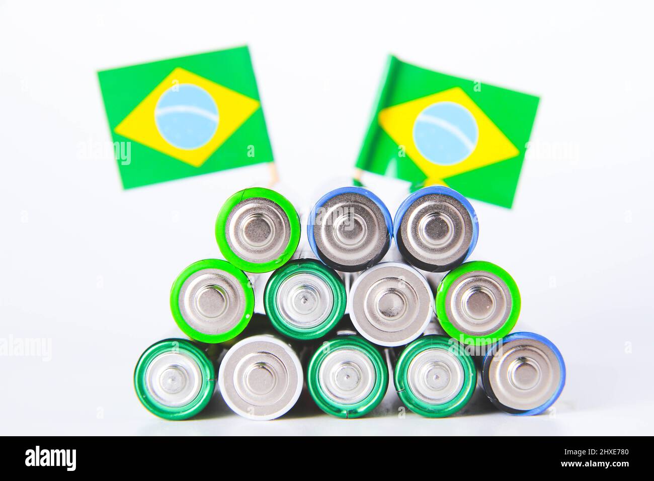 Battery. A lot of batteries on the background of the flag of brazil ...
