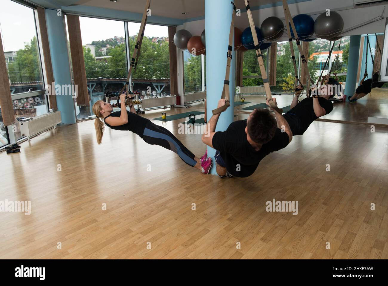 Functional Fitness Workout in Sport Gym With Suspension Training Trx ...