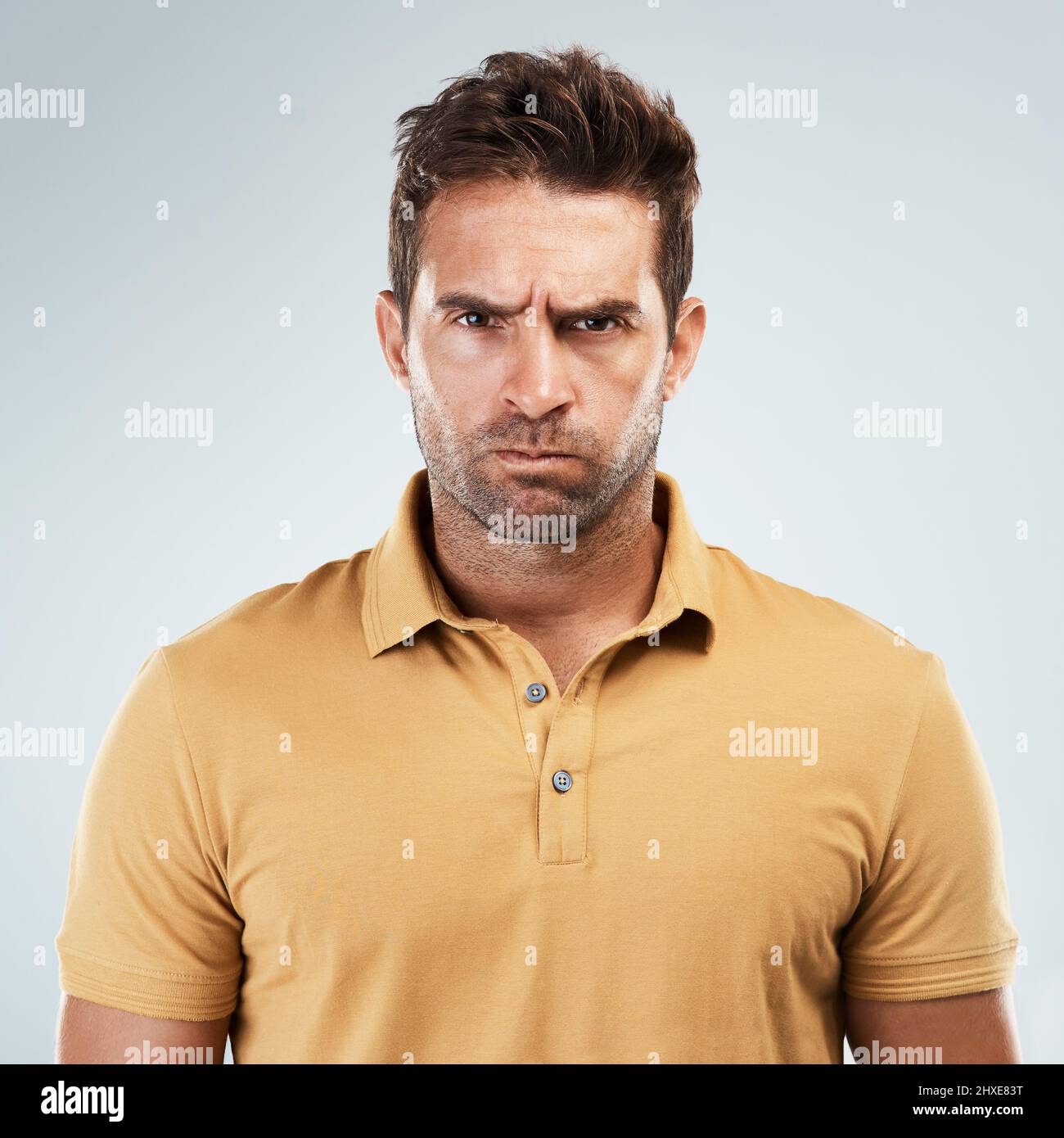 No more mister nice guy. Portrait of a young man with an angry ...