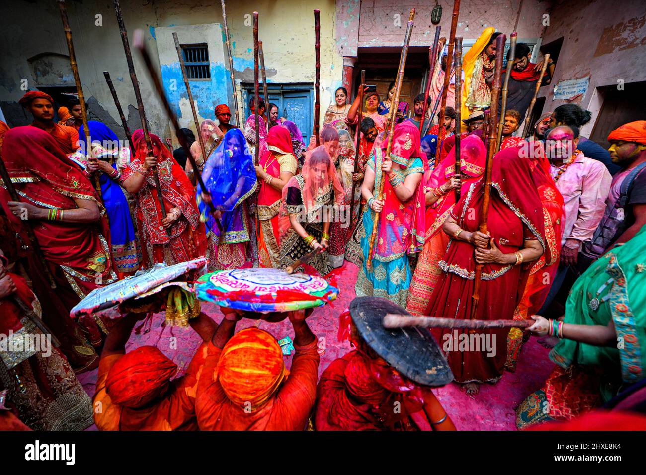 Hindu men are being ritually beaten with sticks (Lathi) during the ...