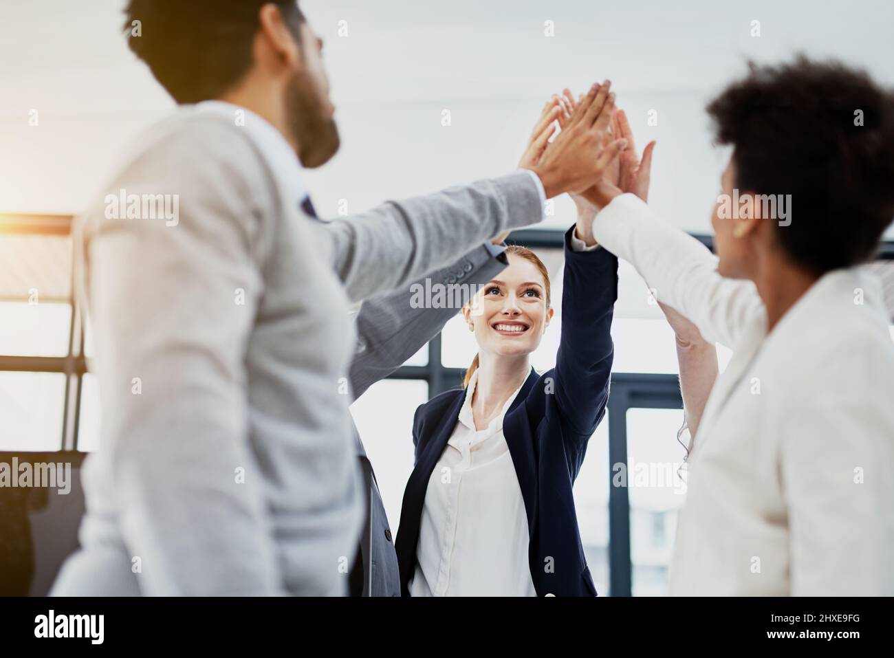 Teamwork is a win-win situation for everyone. Shot of a group of ...