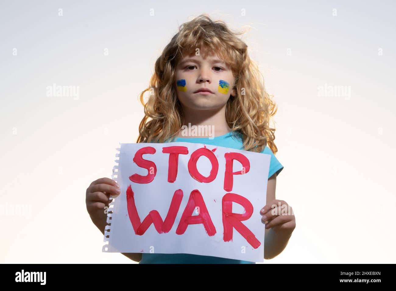 Child protest against war. Portrait kid calls to Stop war, raises ...