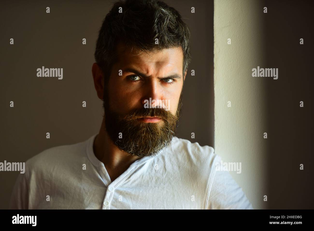 Brutal angry gang man lifestyle, serious handsome guy. Shadow male face ...