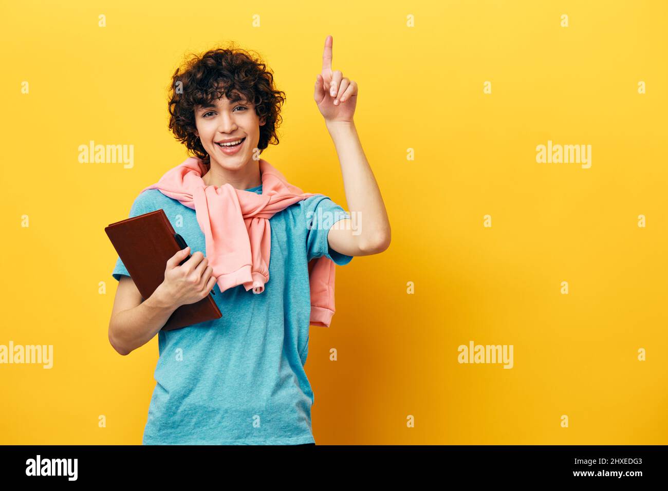 curly guy education with notepad hand gesture Lifestyle school Stock ...