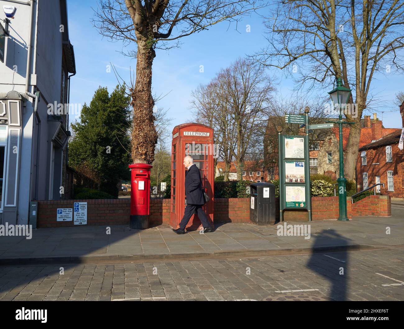 Red pillar box and telephone booth example Stock Photo - Alamy