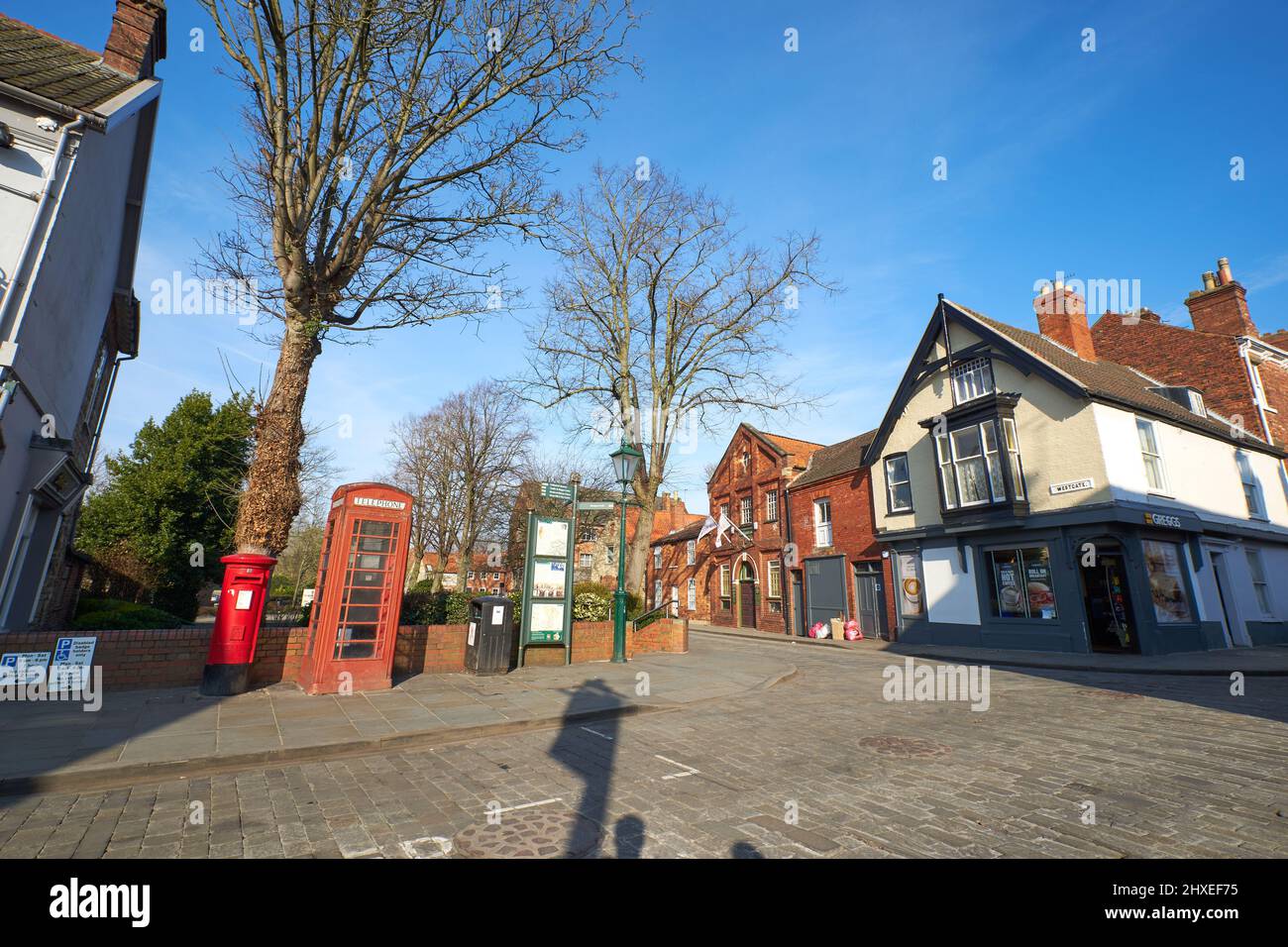 Red pillar box and telephone booth example Stock Photo - Alamy
