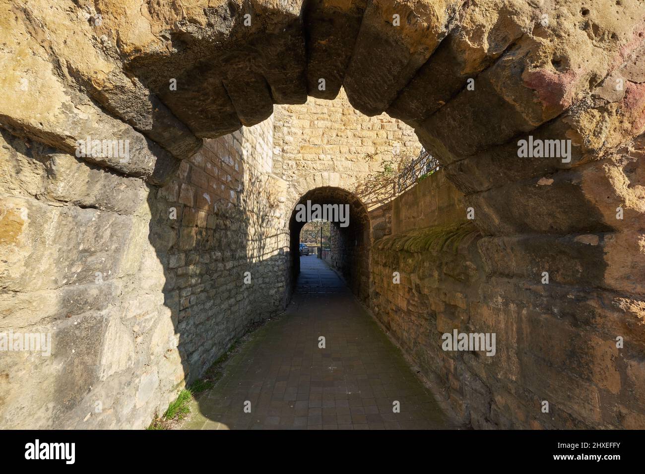 Narrow stone arch and tunnel Stock Photo - Alamy