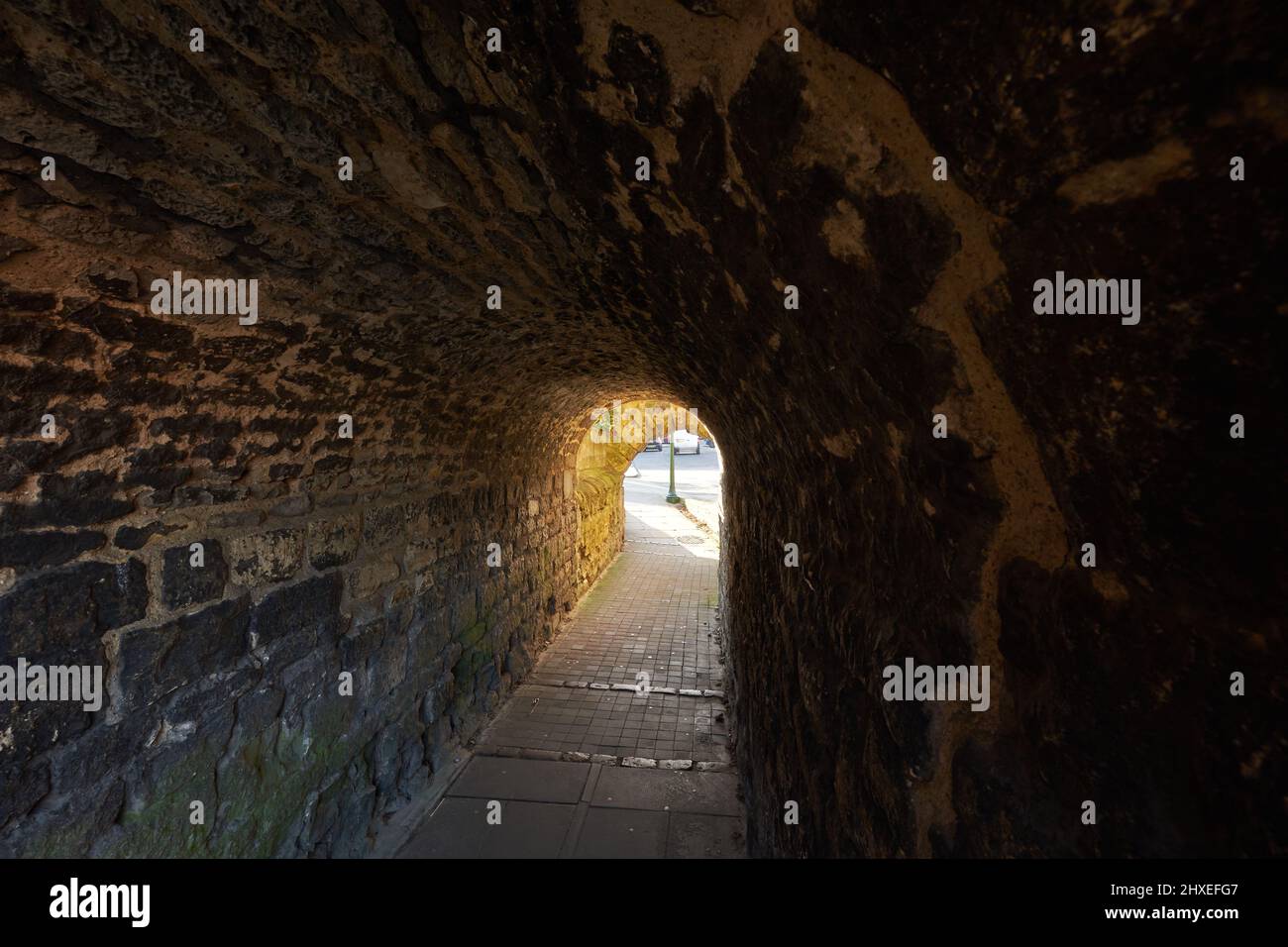 Narrow stone arch and tunnel Stock Photo - Alamy