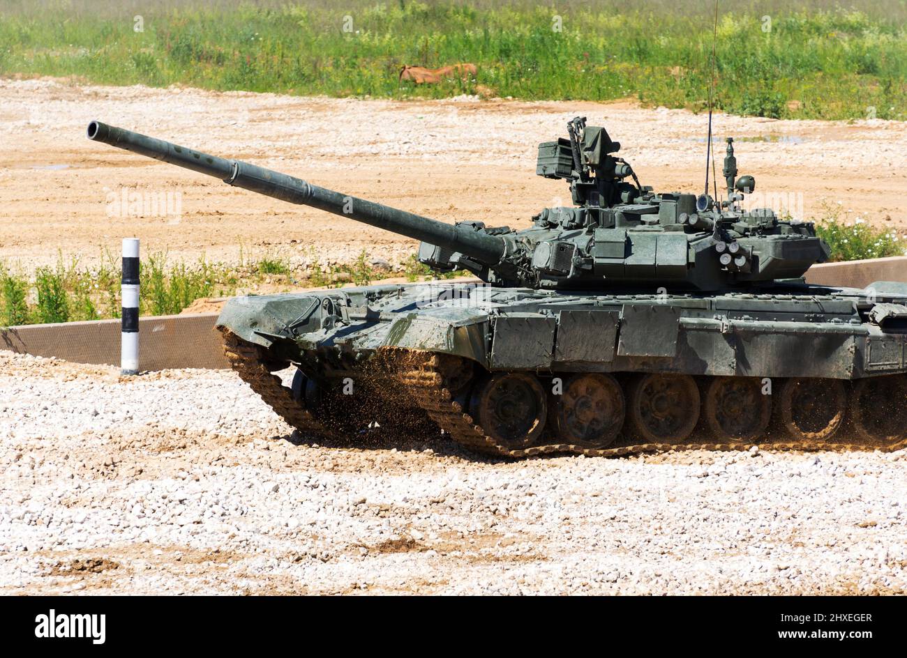 Tank on a field. Modern military equipment Stock Photo - Alamy