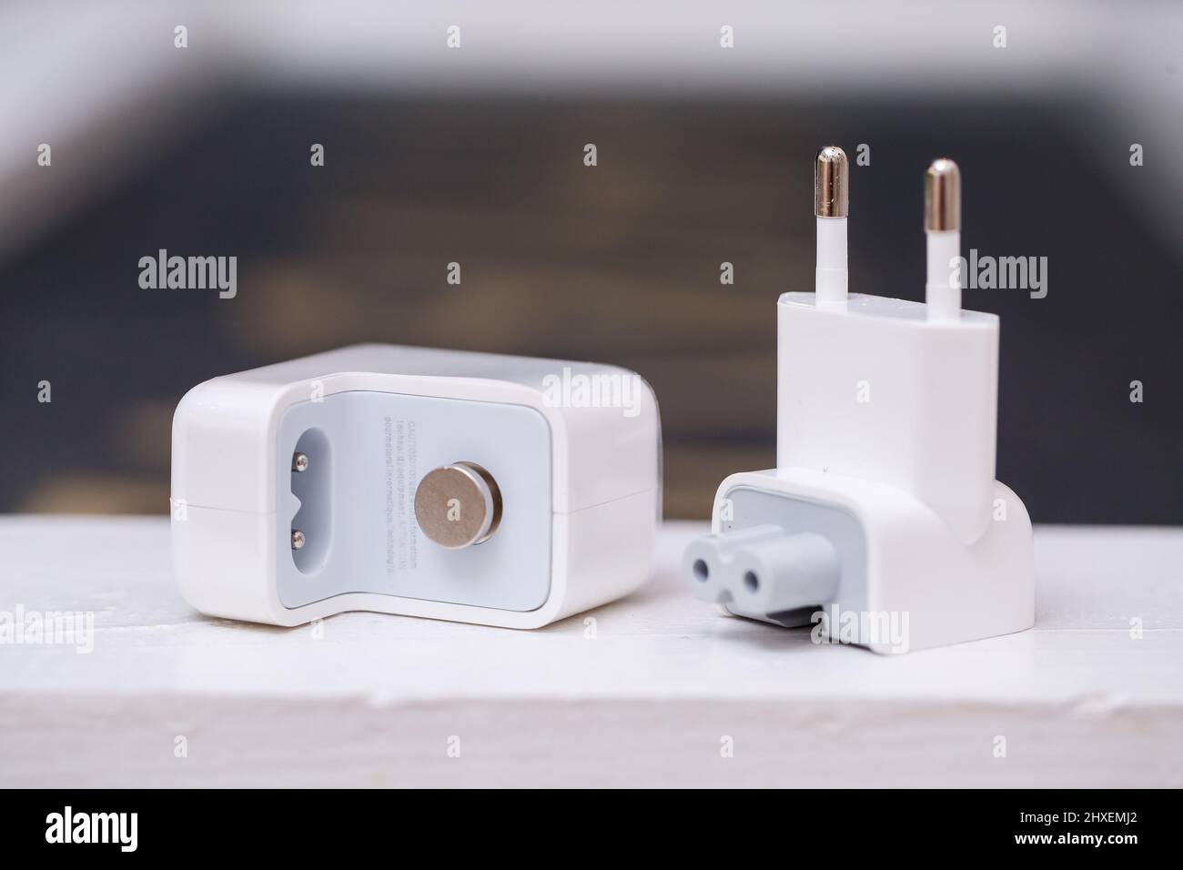 White USB charger for gadgets and mobile phones. Charging from the ...
