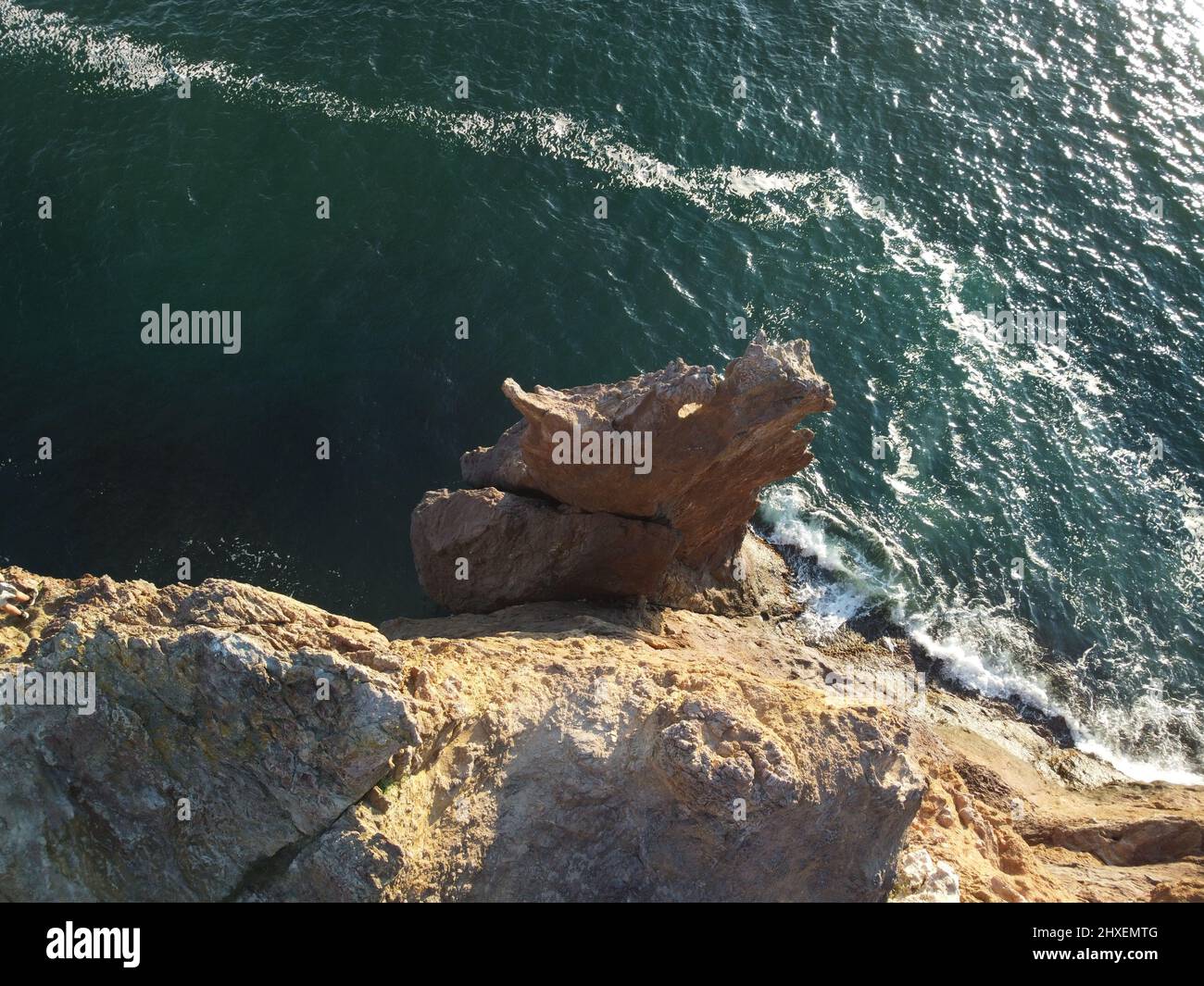 Dragon head arise from the water - The rock or lava formation with the ...