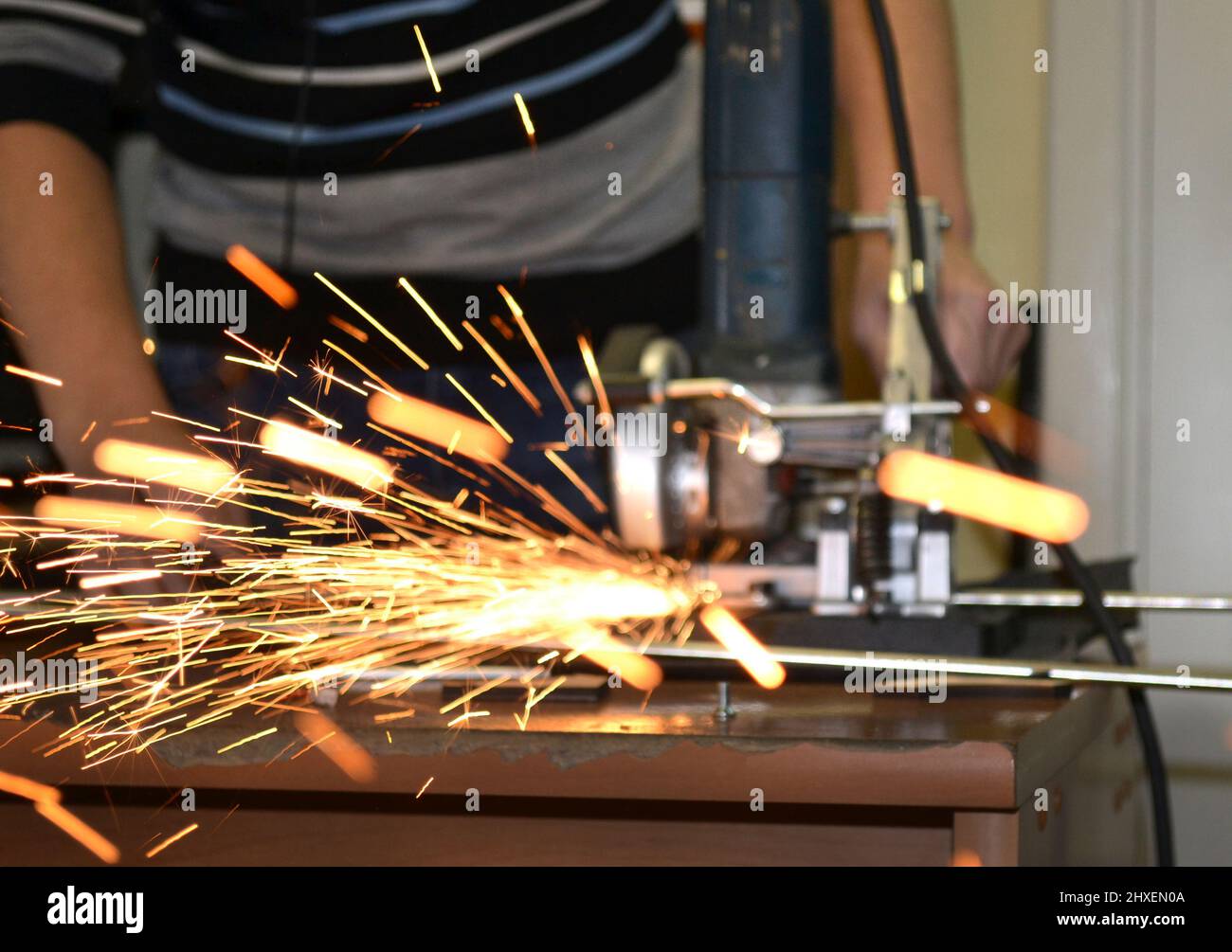 Grinding machine cuts metal factory hi-res stock photography and images ...
