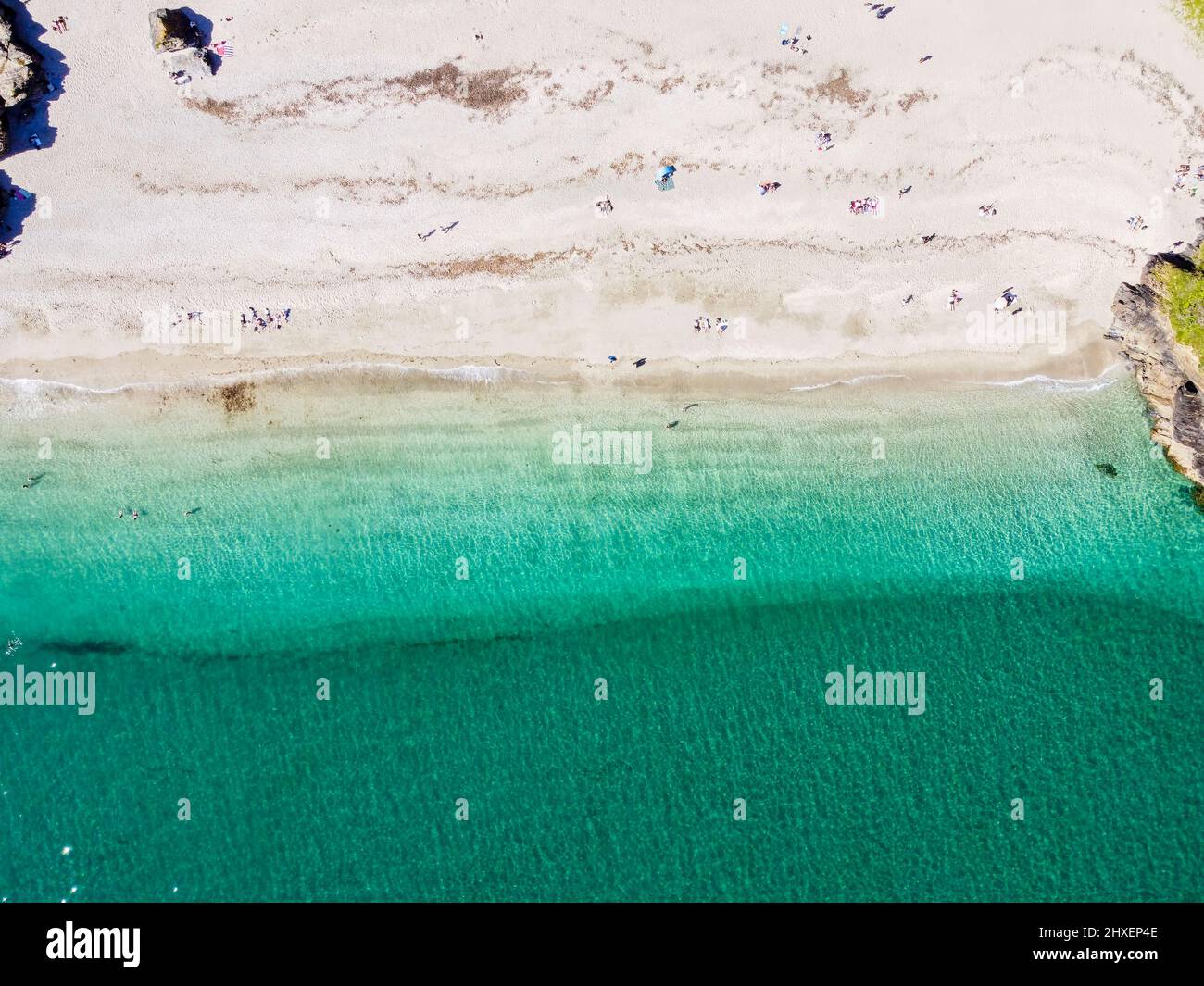 Aerial view of the stunning coastline and beach at Lantic Bay. Crystal ...