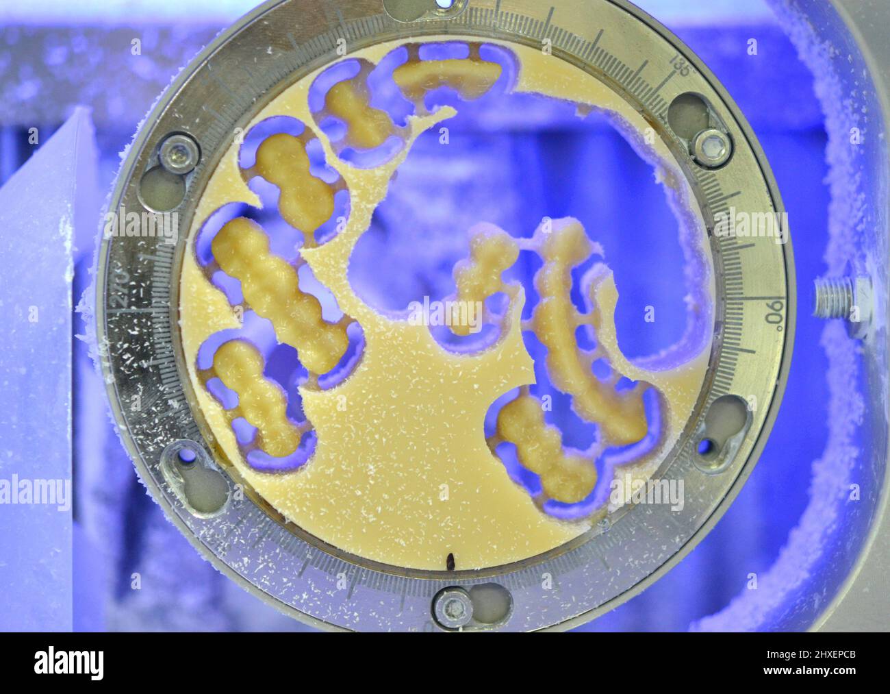 Dental milling machine carving out shape of human teeth Stock Photo - Alamy