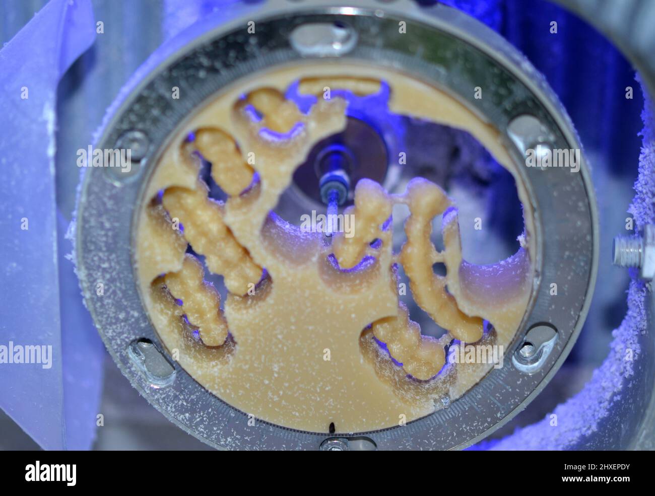 Dental milling machine carving out shape of human teeth Stock Photo - Alamy