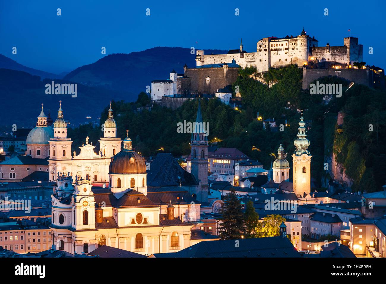 Great view from the top on an evening city shining in the lights ...