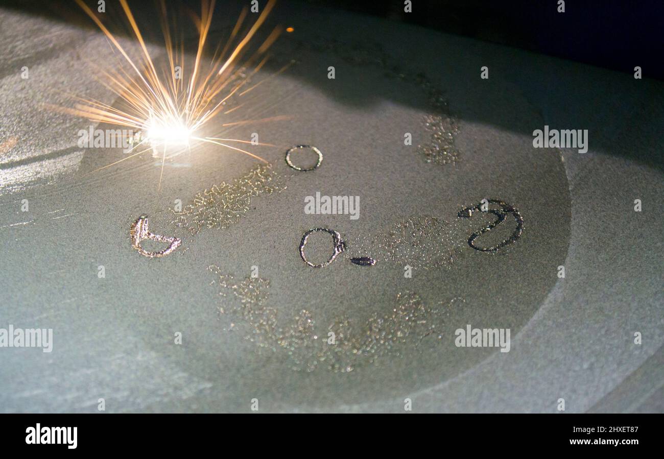 Laser sintering machine for metal. 3D printer printing metal Stock ...