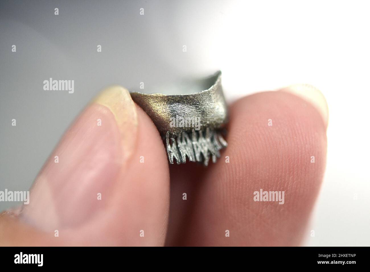 Small object printed on metal 3d printer macro Stock Photo - Alamy