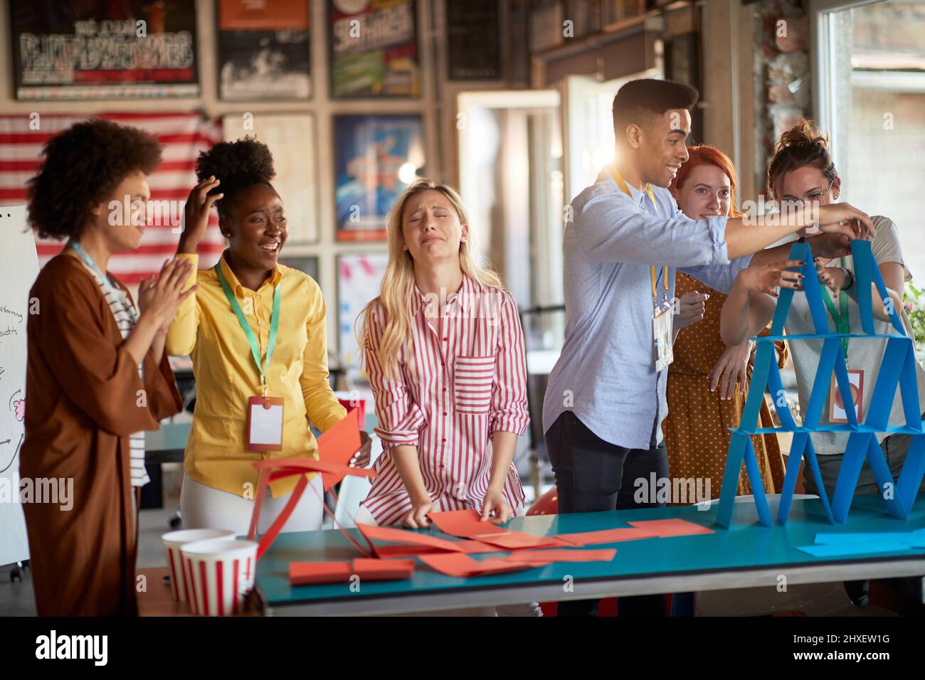 Group of employees having competition together at the office; Casual ...