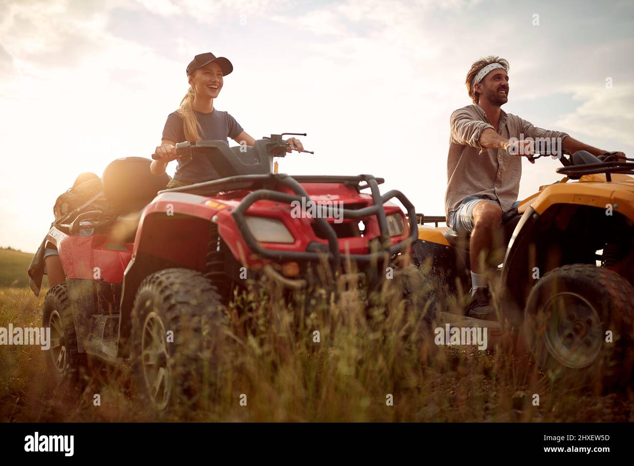 Young couple riding atv quad hi-res stock photography and images - Alamy