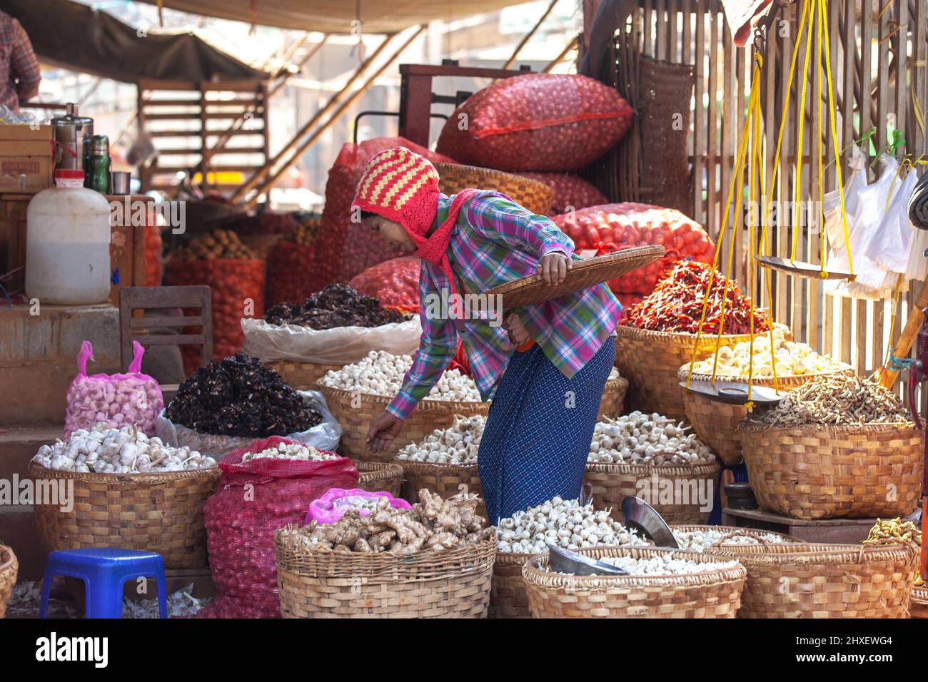 Mandalay, Myanmar - January 13, 2016: Sellers and workers at the market ...