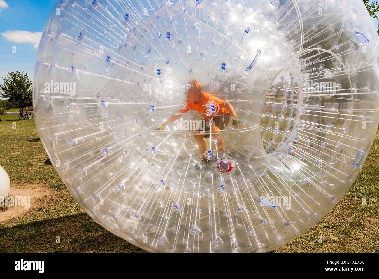 children have a lot of fun in the Zorbing Ball Stock Photo - Alamy