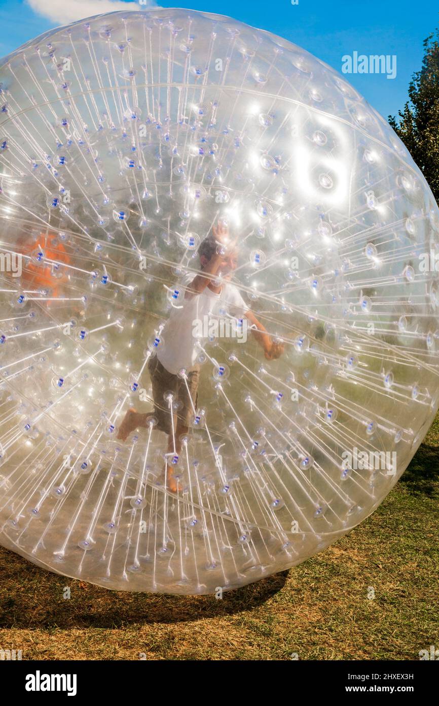 children have a lot of fun in the Zorbing Ball Stock Photo - Alamy