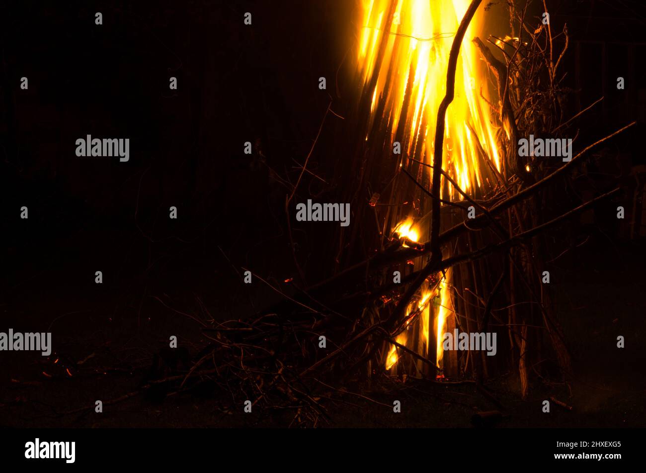 Flames rising from a bonfire Stock Photo - Alamy