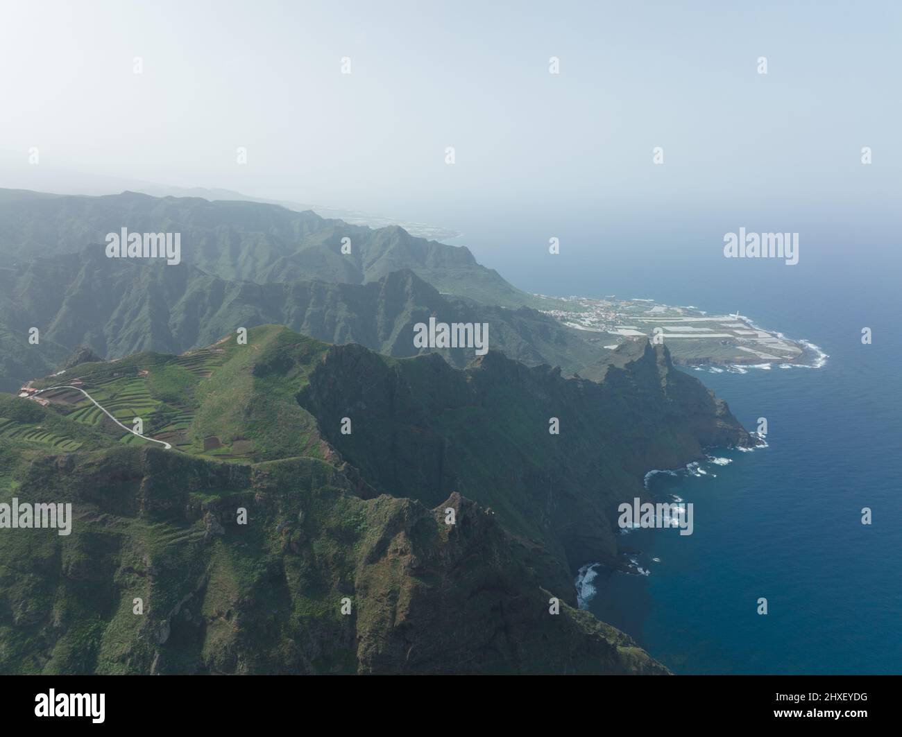Mountain aerial of cliffs, high mountains, along the Atlantic coast ...