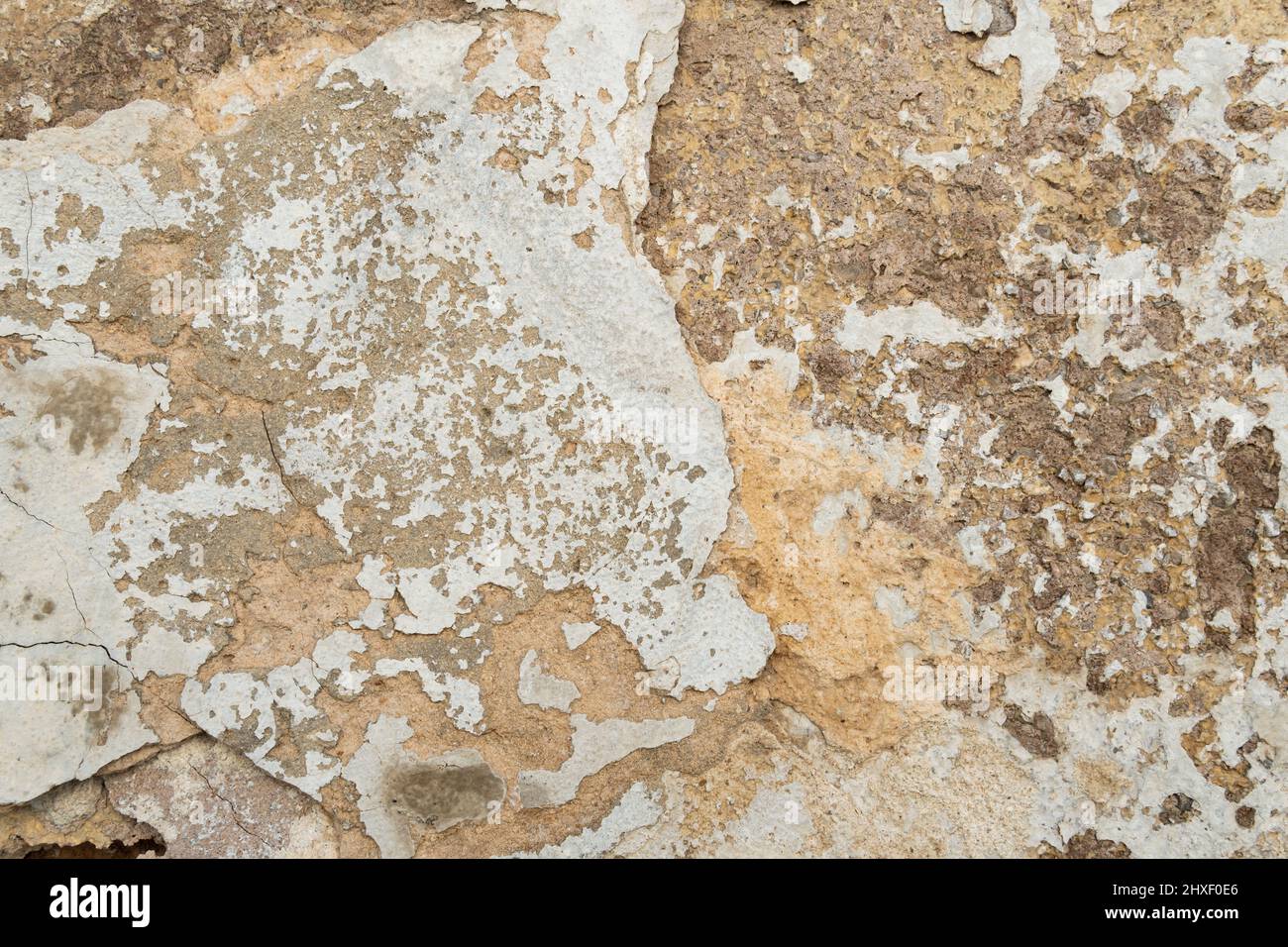 Close-up of the mares stone texture with lime mortar, deteriorated by ...
