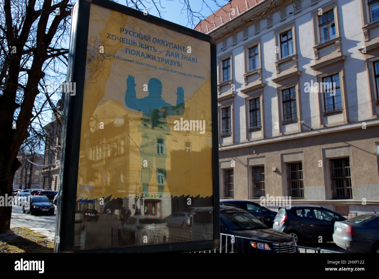 LVIV, UKRAINE - MARCH 11, 2022 - A poster urges the Russian invader to ...