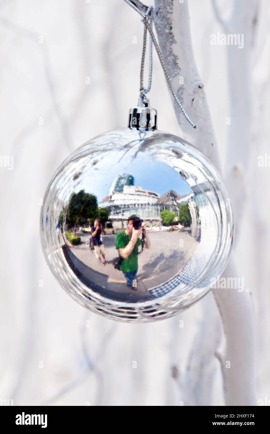 christmas tree balls and mirroring of father and sun with fun Stock ...