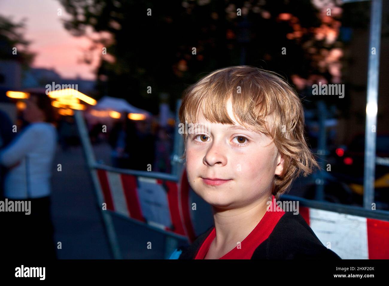 boy watchs interrested the scene by night Stock Photo - Alamy