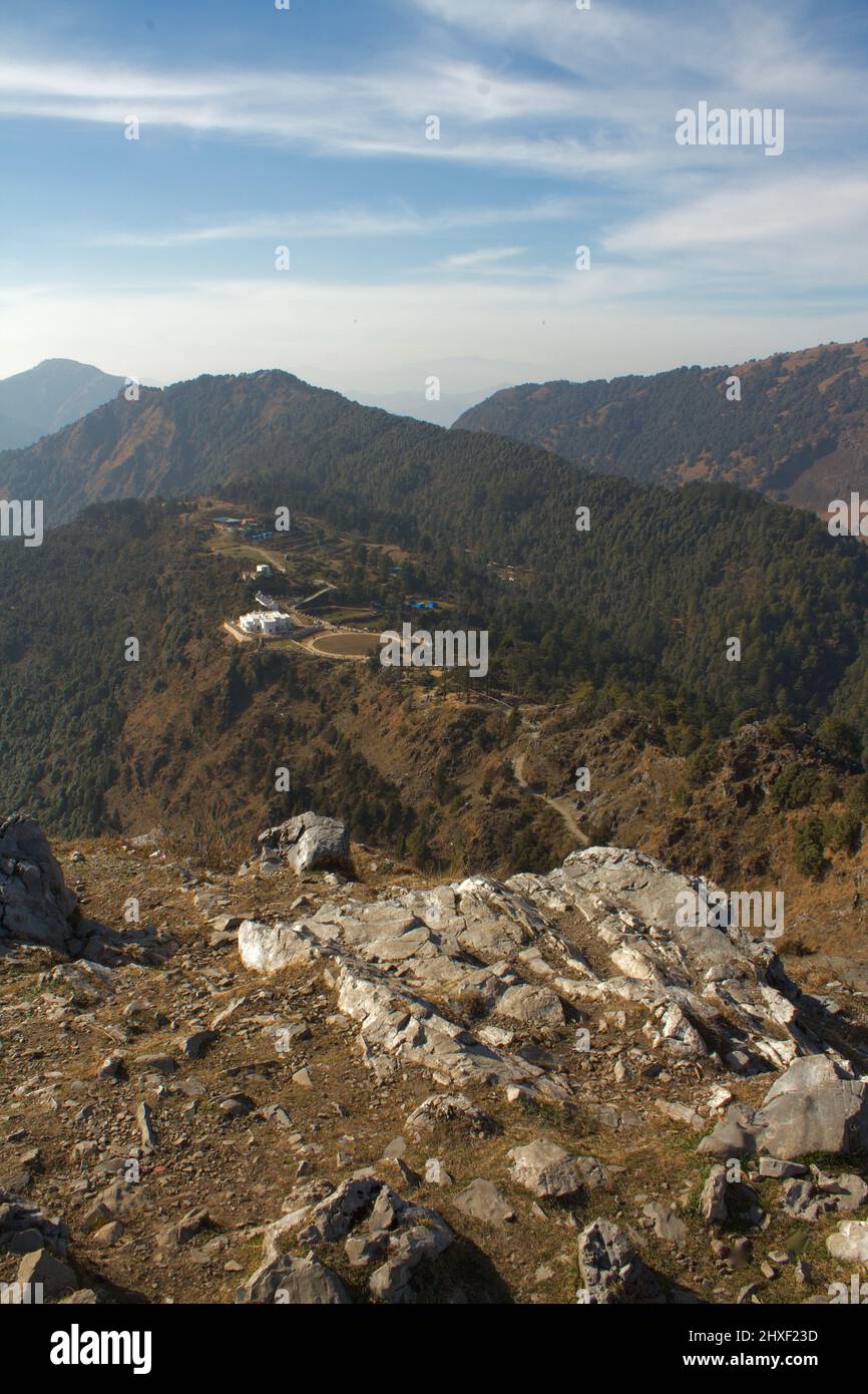 The photograph was taken in the afternoon under blue sky, with rocks ...