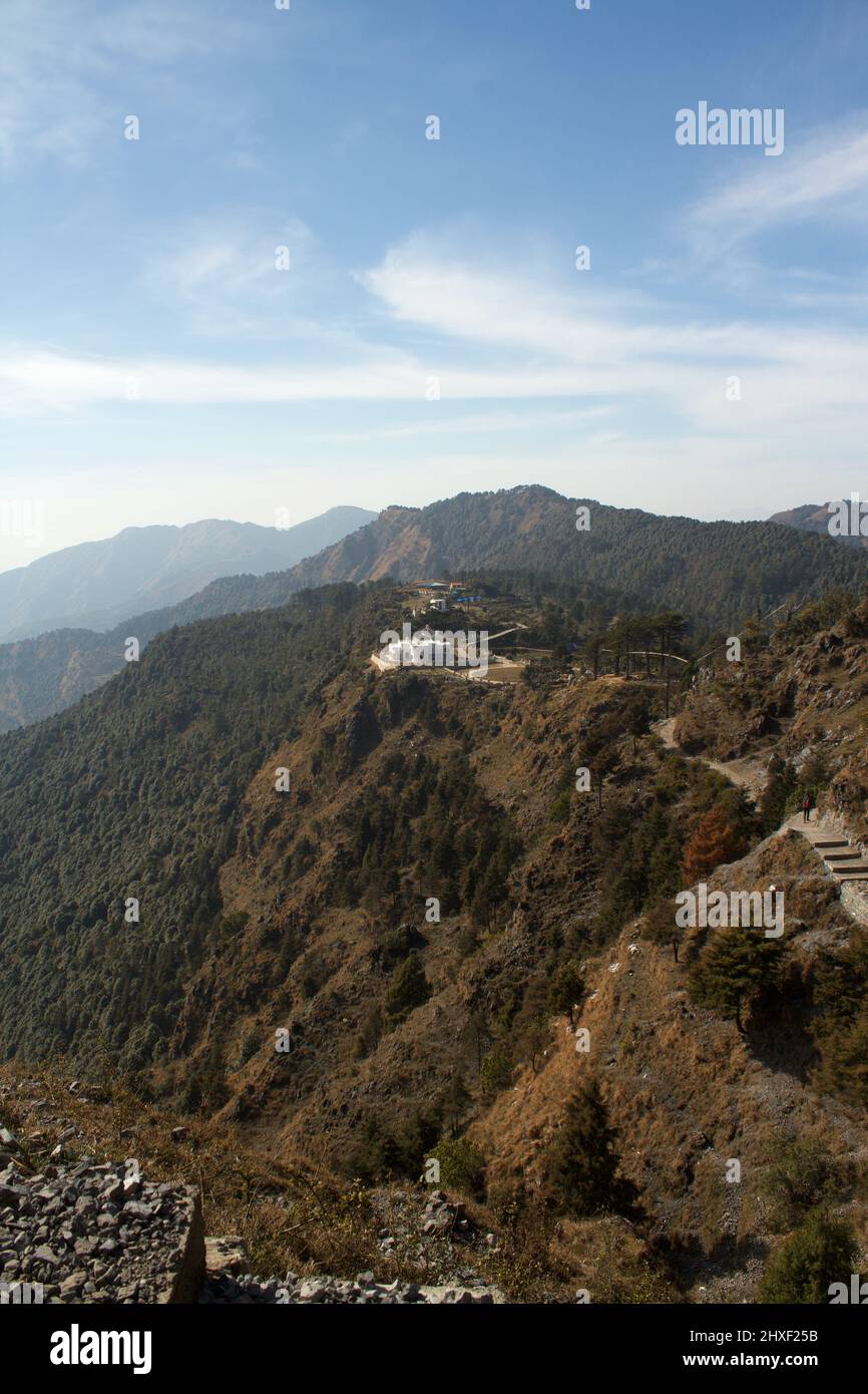 The photograph was taken in the afternoon under blue sky, with rocks ...