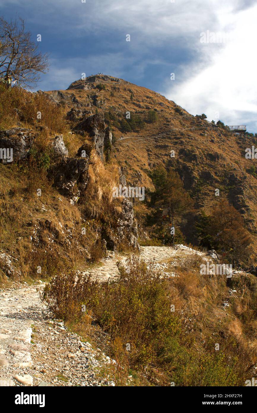 The photograph was taken in the afternoon under blue sky, with rough ...