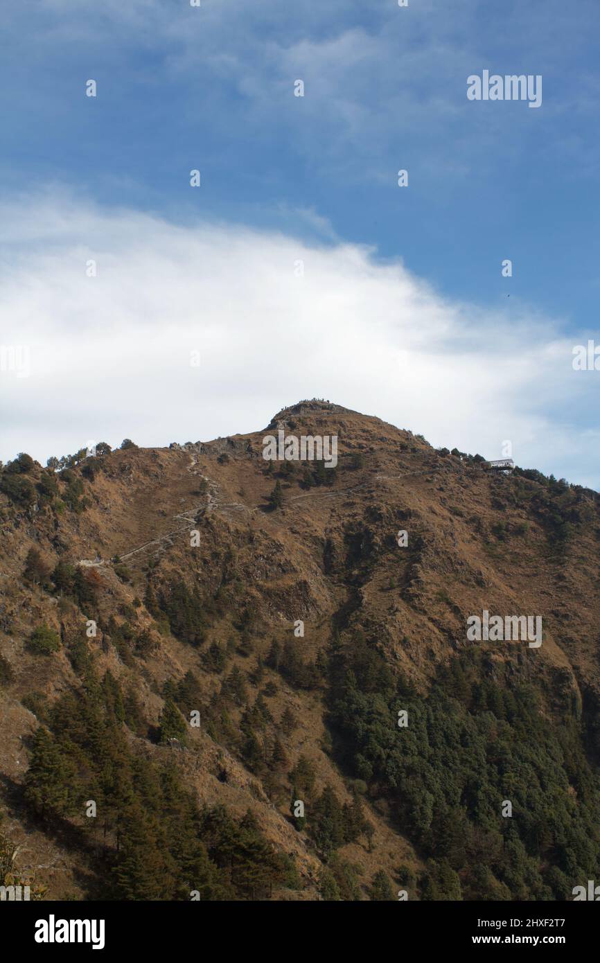 The photograph was taken in the afternoon under blue sky, with rough ...
