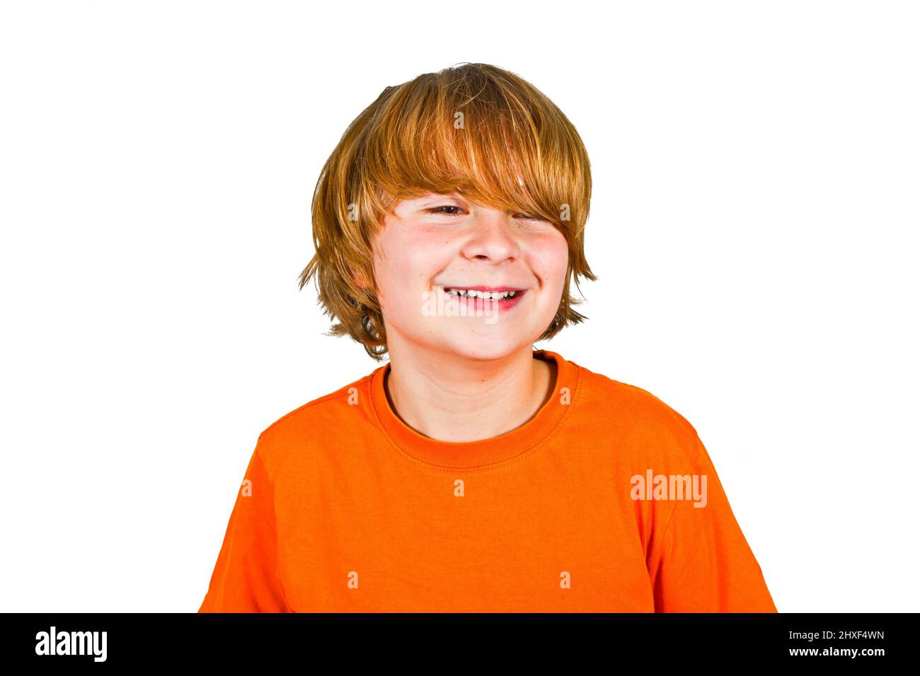 young smart boy has fun posing in studio Stock Photo - Alamy