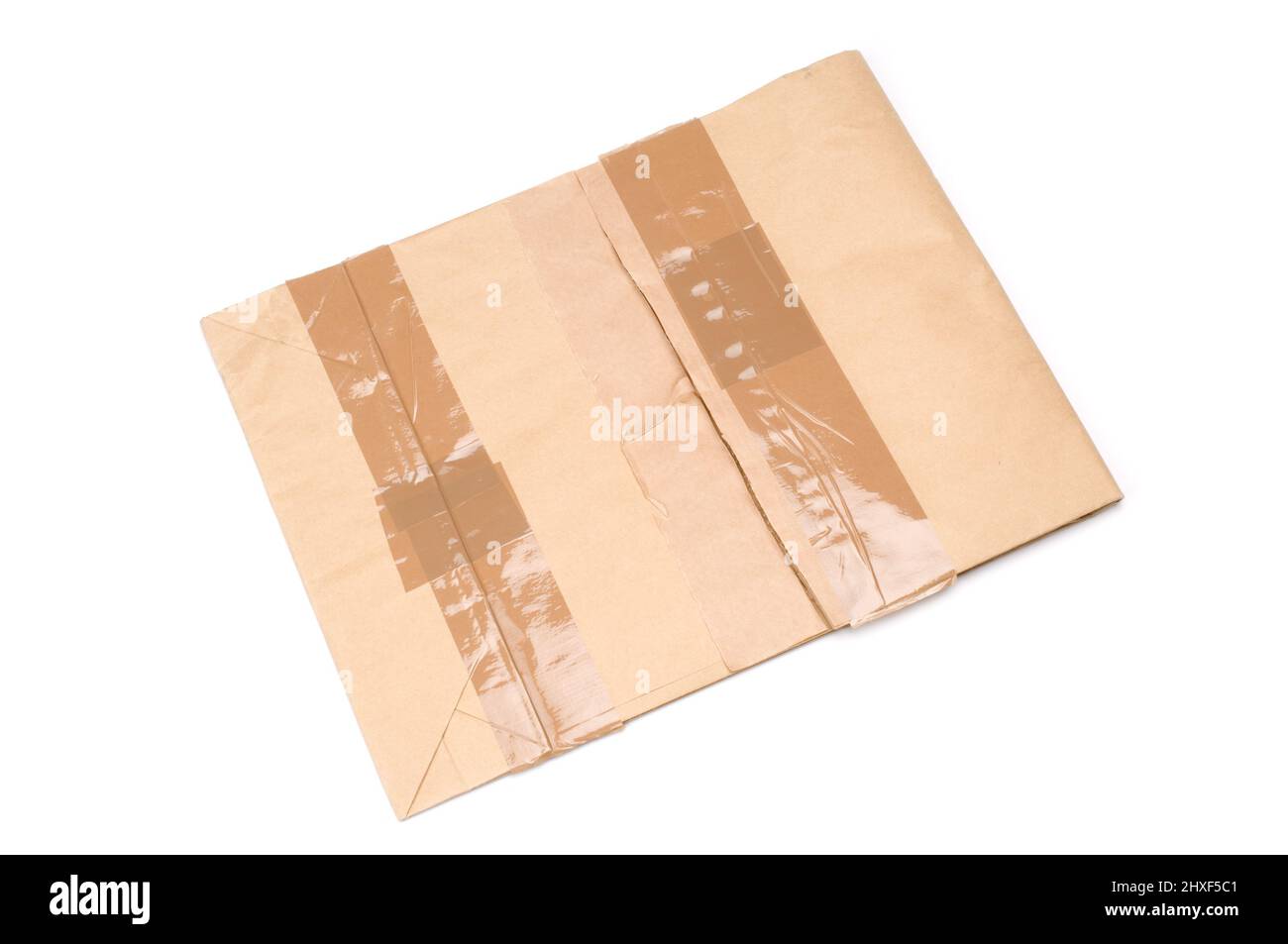 Taped paper envelope on white background Stock Photo - Alamy