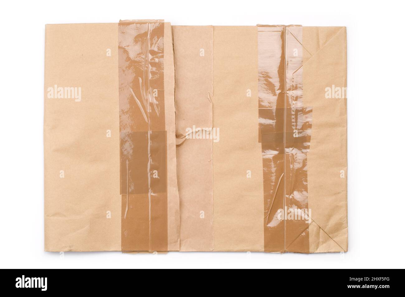 Taped paper envelope on white background Stock Photo - Alamy