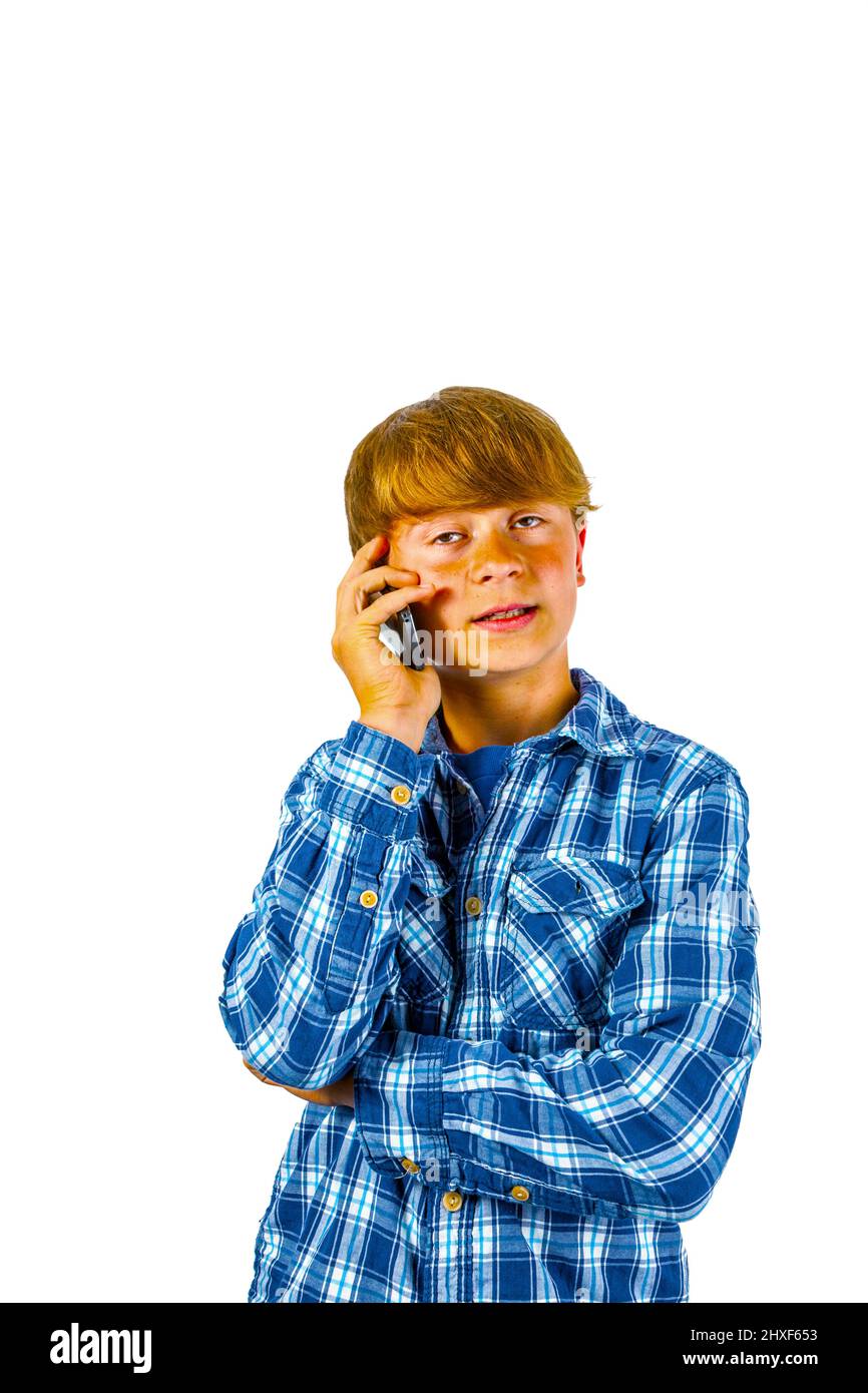 cute handsome young boy using his mobile phone Stock Photo - Alamy