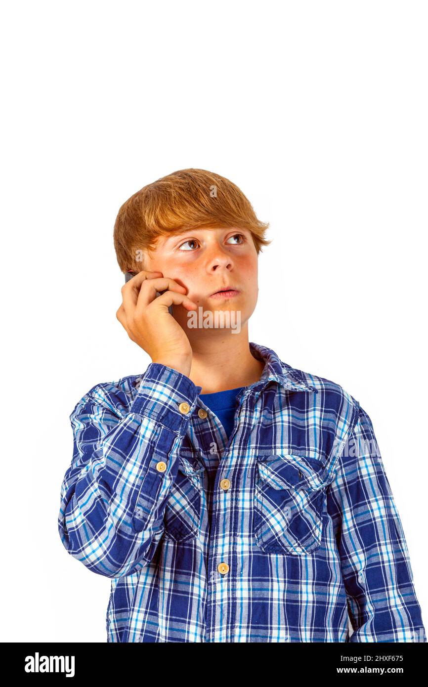 cute handsome young boy using his mobile phone Stock Photo - Alamy