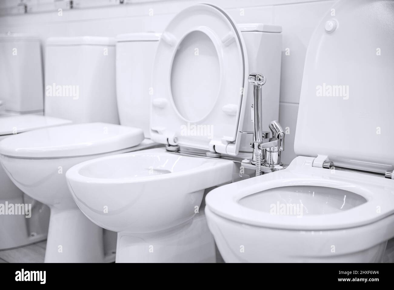 White ceramic toilet bowls hi-res stock photography and images - Alamy
