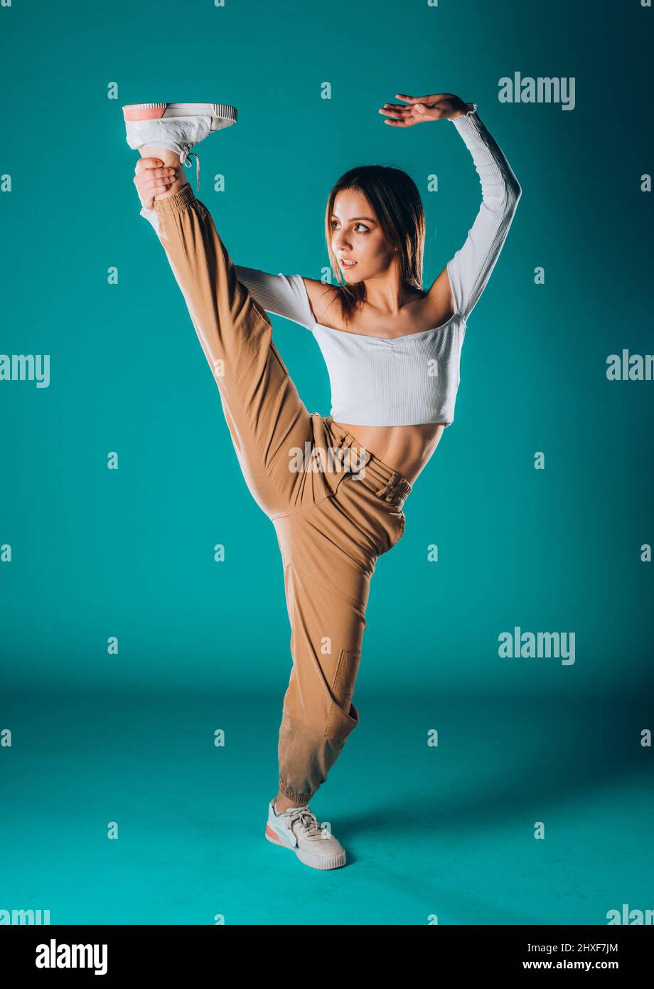 Athletic dancer performing an element of dance gymnastics Stock Photo ...