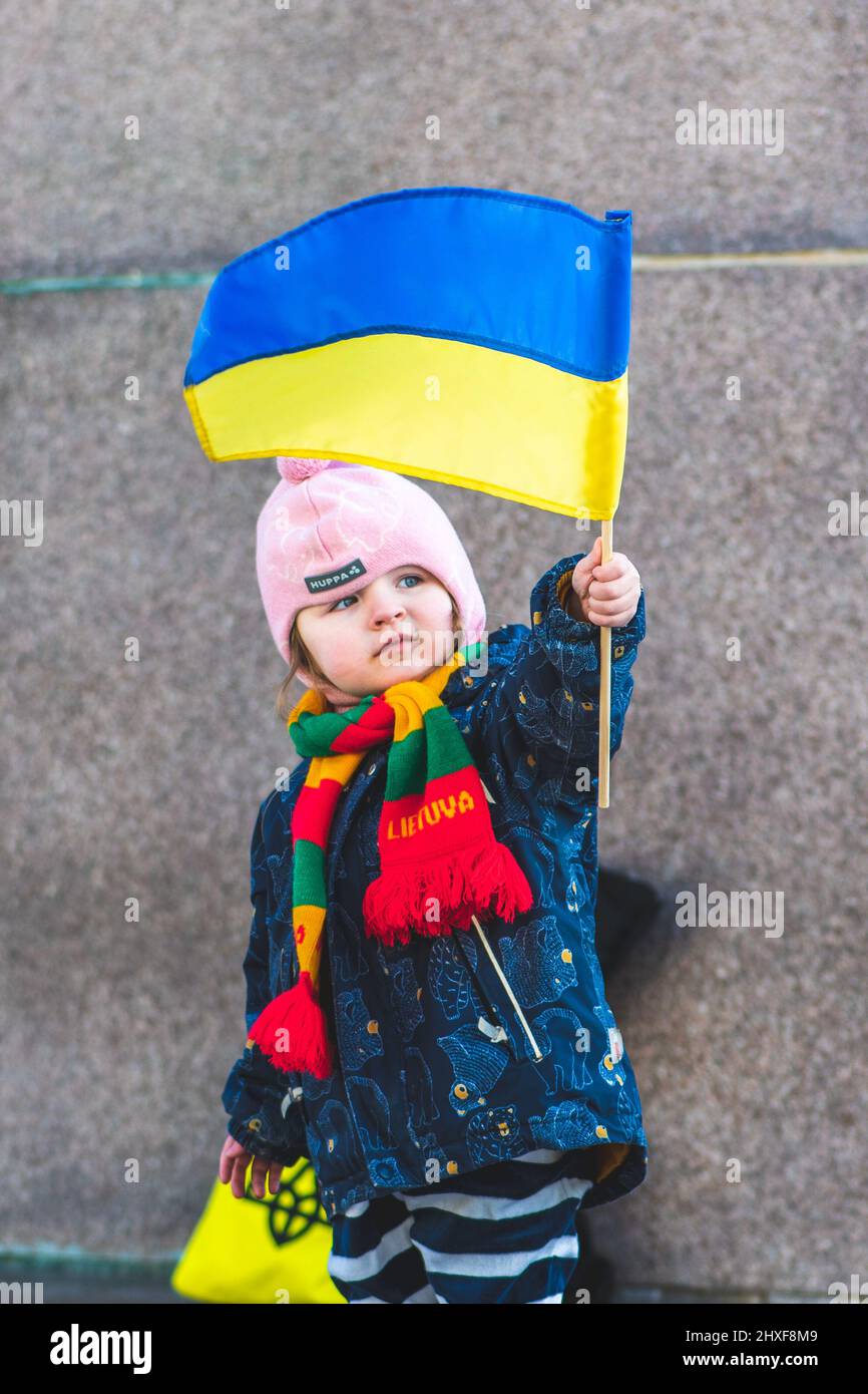 Little pretty child or kid with winter clothes, pink hat, Lithuanian ...