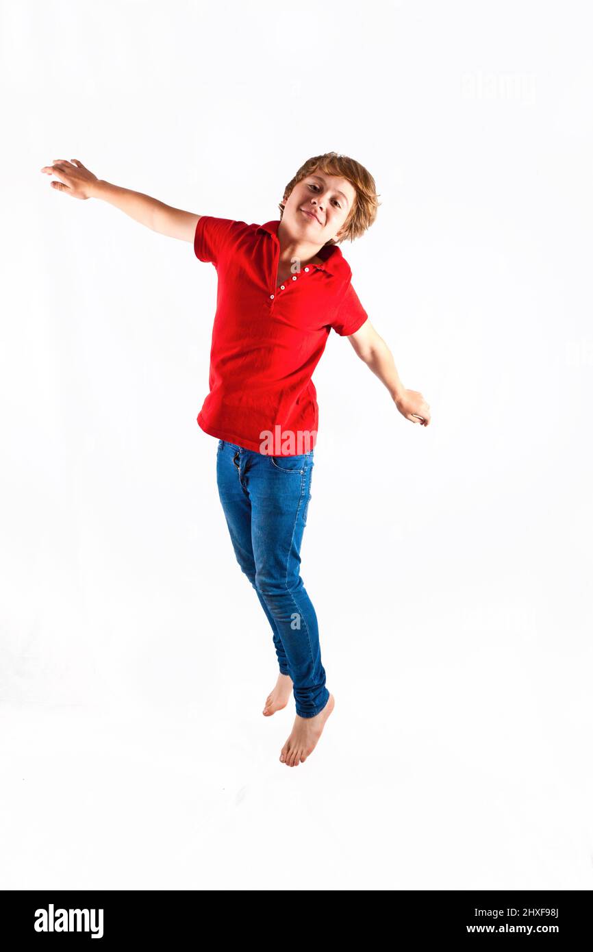 cute boy jumping in the air Stock Photo - Alamy