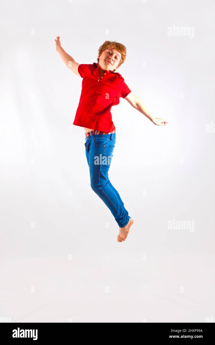 cute boy jumping in the air Stock Photo - Alamy