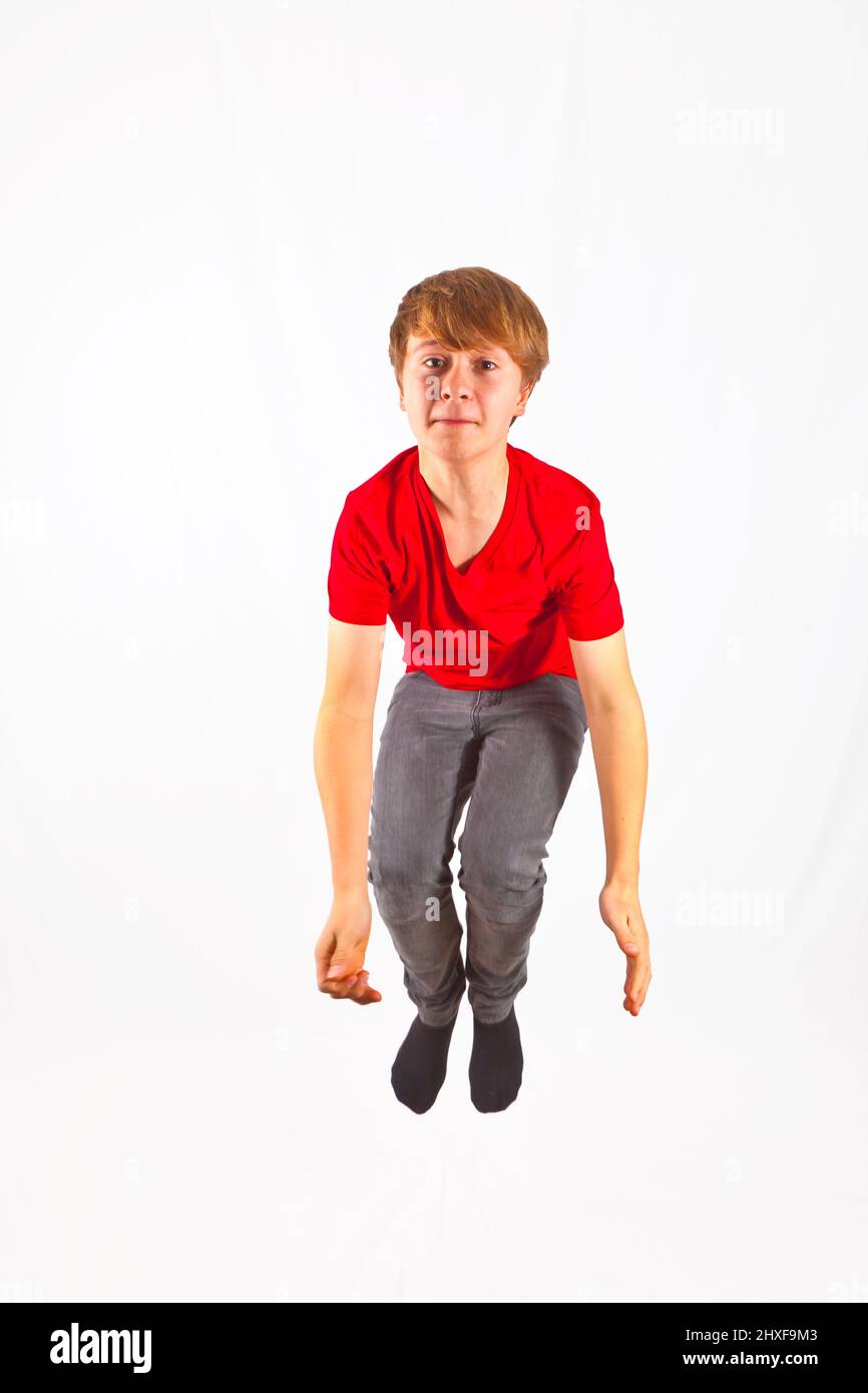 Beautiful happy boy jumping isolated hi-res stock photography and ...