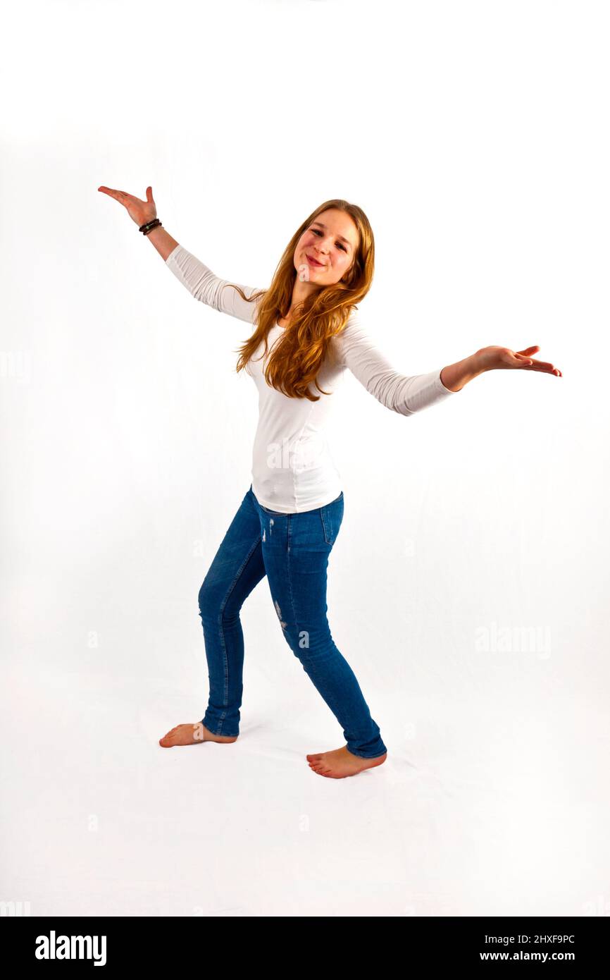 Full length portrait of happy beautiful girl dancing and posing ...