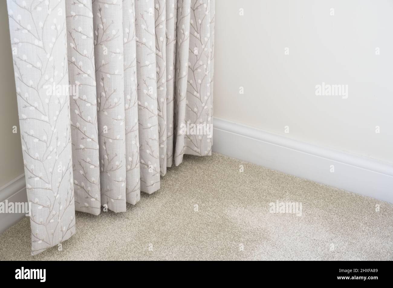 Neutral colour home interior showing curtains and carpet Stock Photo ...